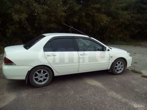 Mitsubishi Lancer '2003, IX [рестайлинг]